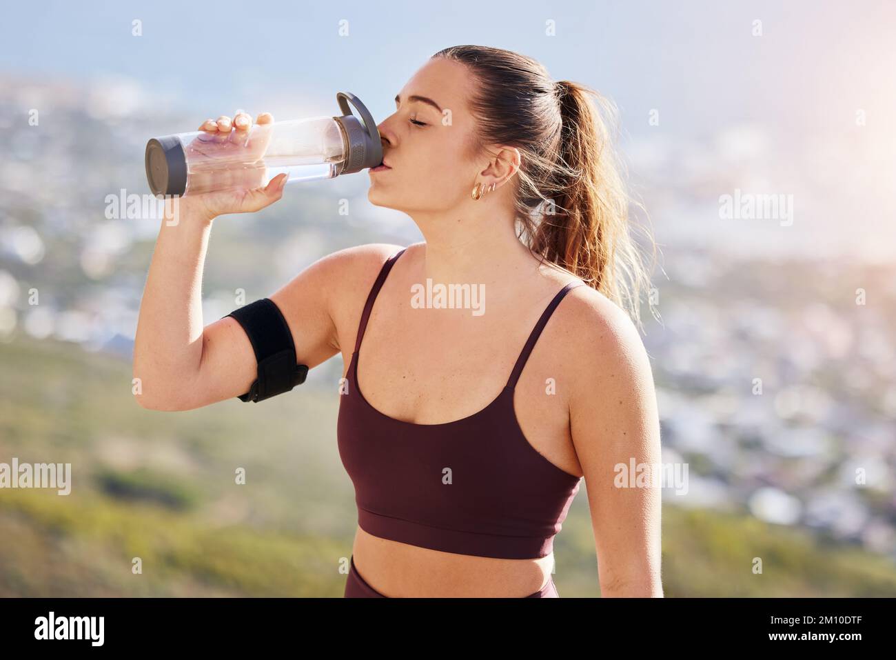 Water, fitness and drink water after hiking, workout and challenge for ...