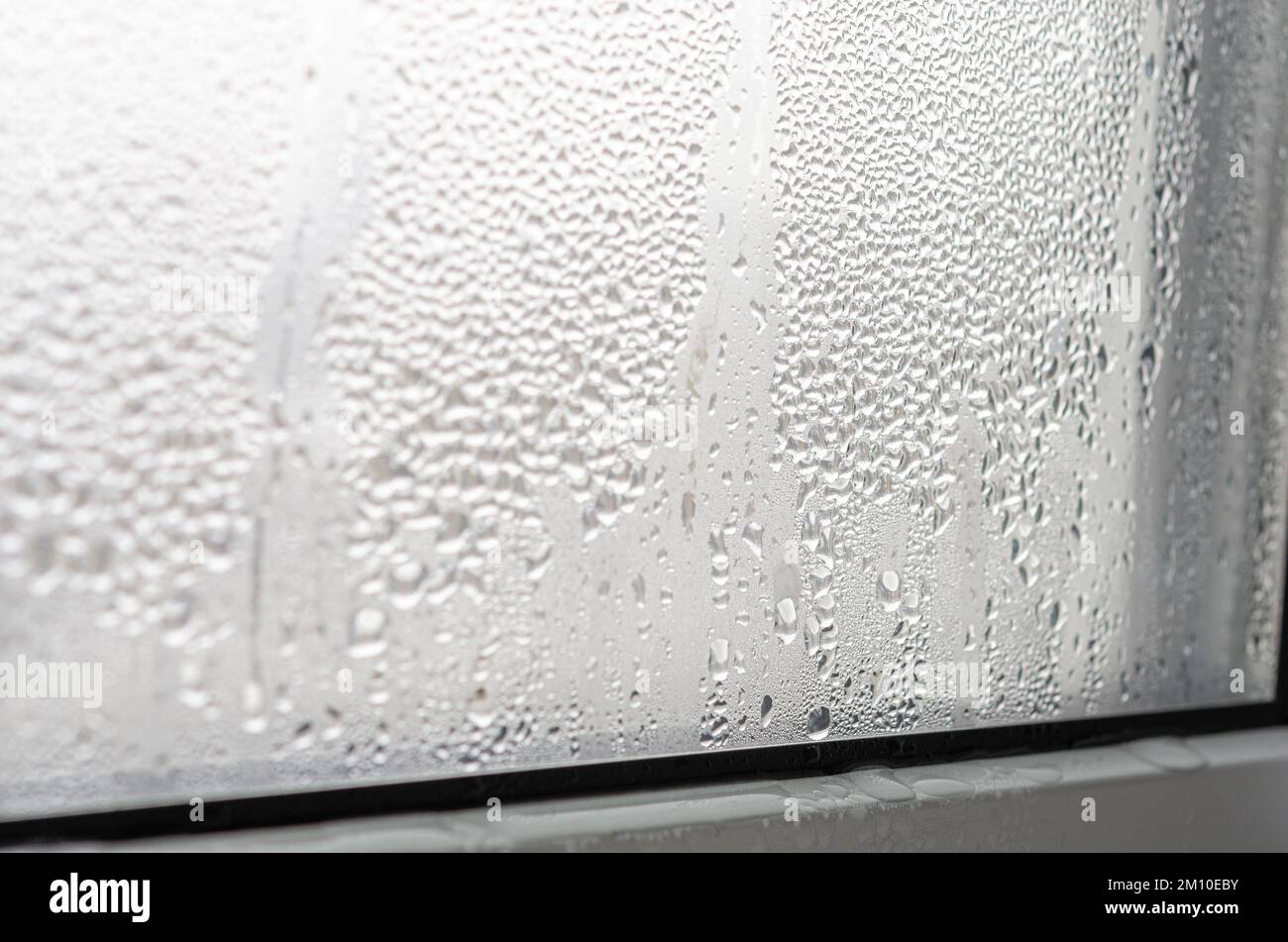 Large drops of condensate on a metal-plastic window Stock Photo - Alamy