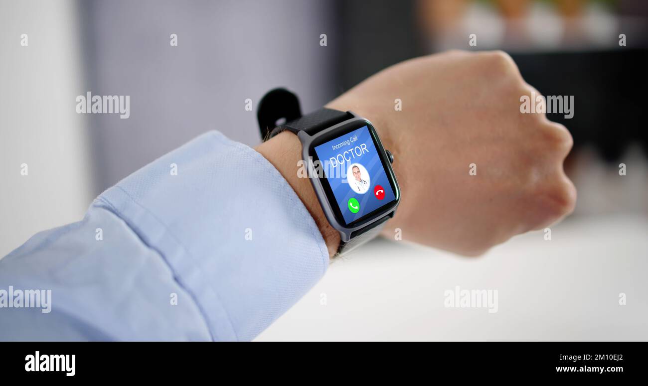 Hand Wearing Smart Watch With Doctor's Incoming Call On Display Stock ...