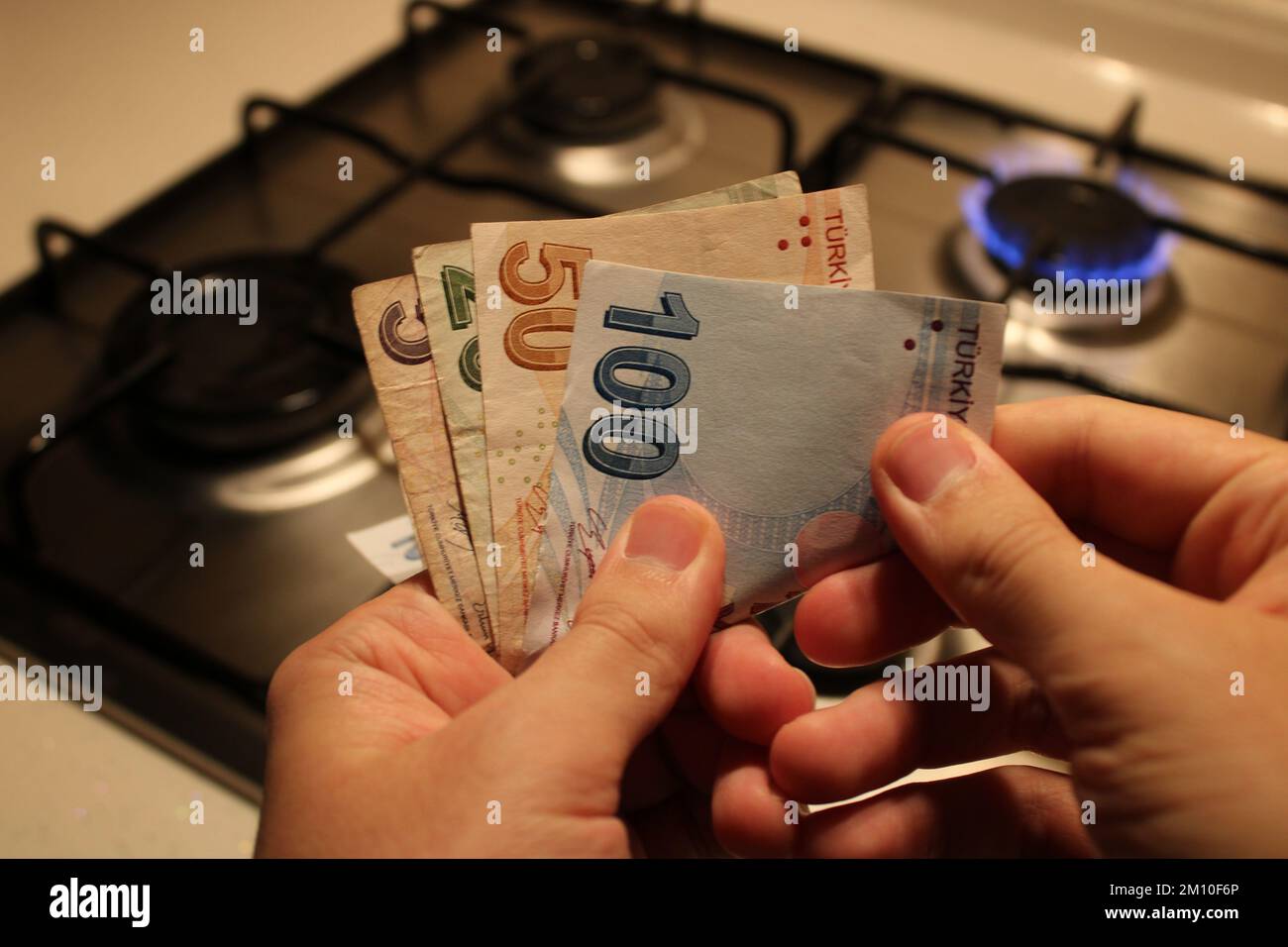 Money control man and woman hi-res stock photography and images - Alamy
