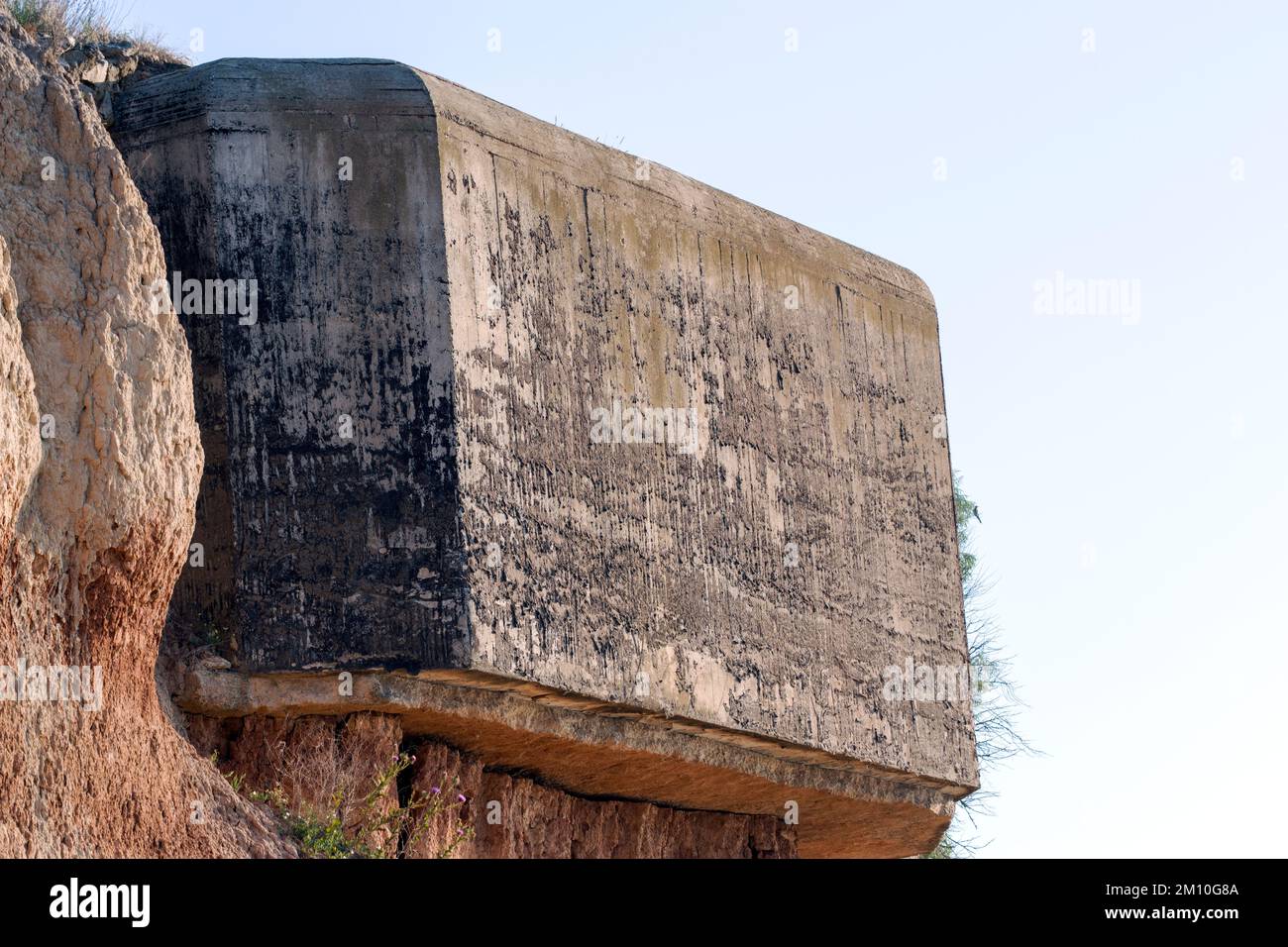 The back wall of an old casemate from the second world war remained ...