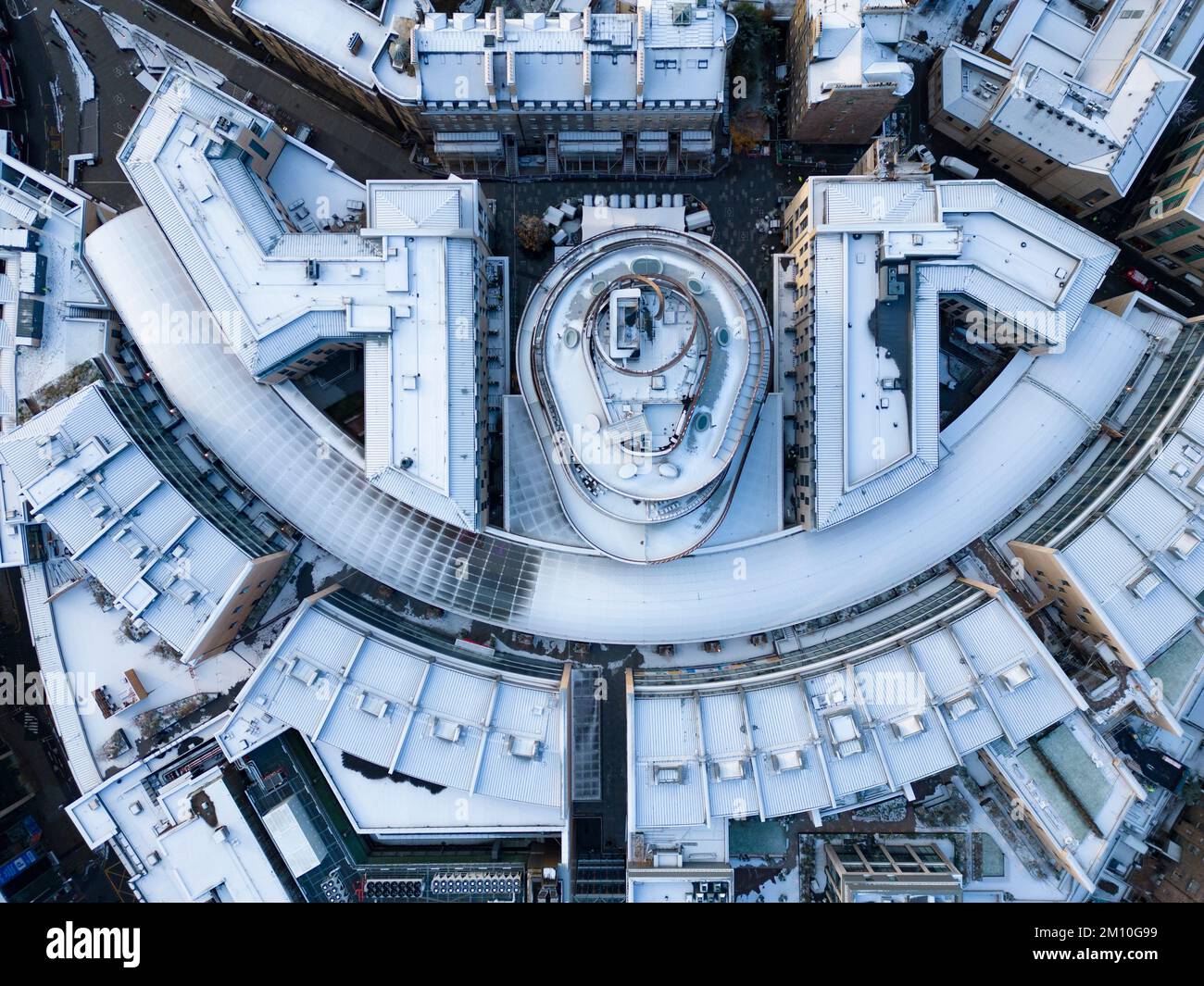 Aerial view of winter snow covered rooftops at St James Quarter in ...