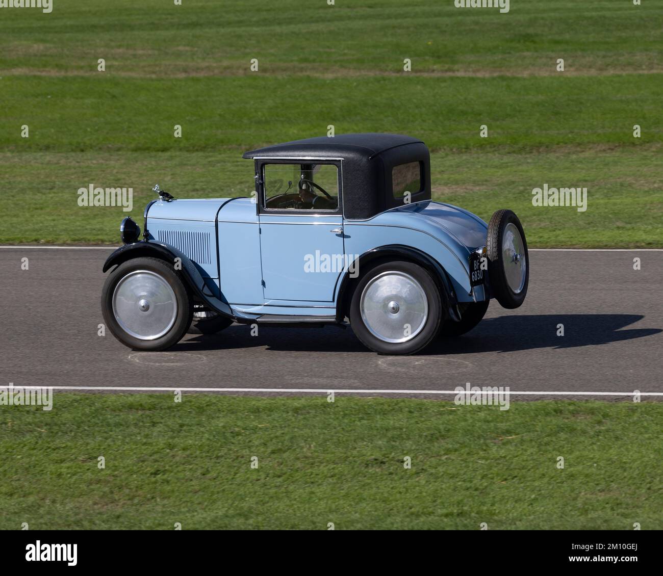 A blue Austin Seven coupe car at the 2022 Goodwood Revival Stock Photo ...
