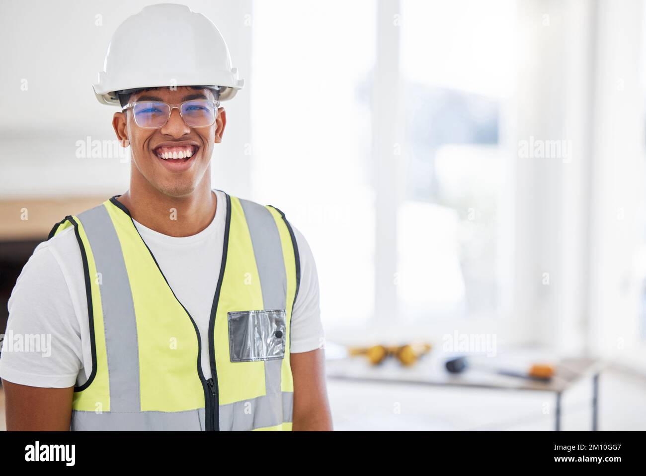 Young handsome contractor working hi-res stock photography and images ...