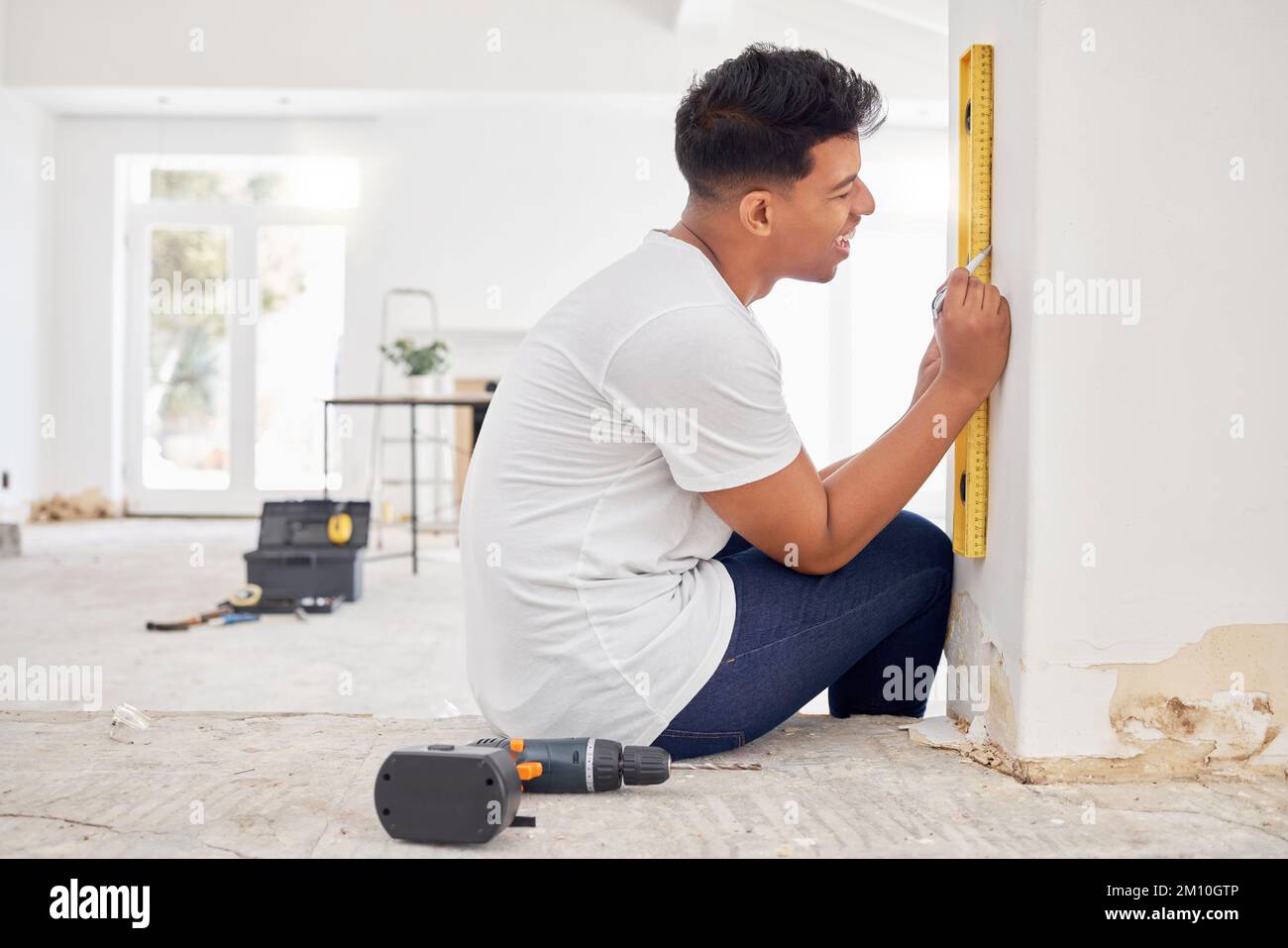 Owning your own property means you have the freedom to renovate. a man ...