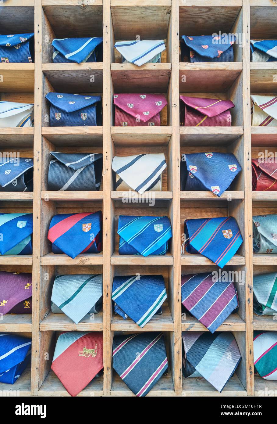 Rack of Cambridge University college ties in a shop window, Cambridge ...