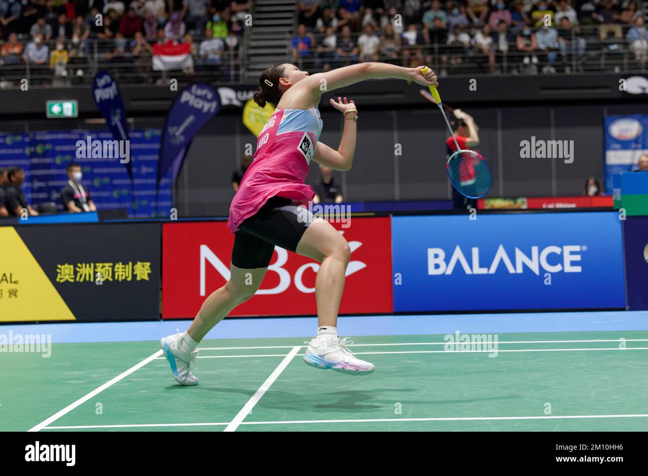 Pornpawee CHOCHUWONG of Thailand in action during the singles match ...
