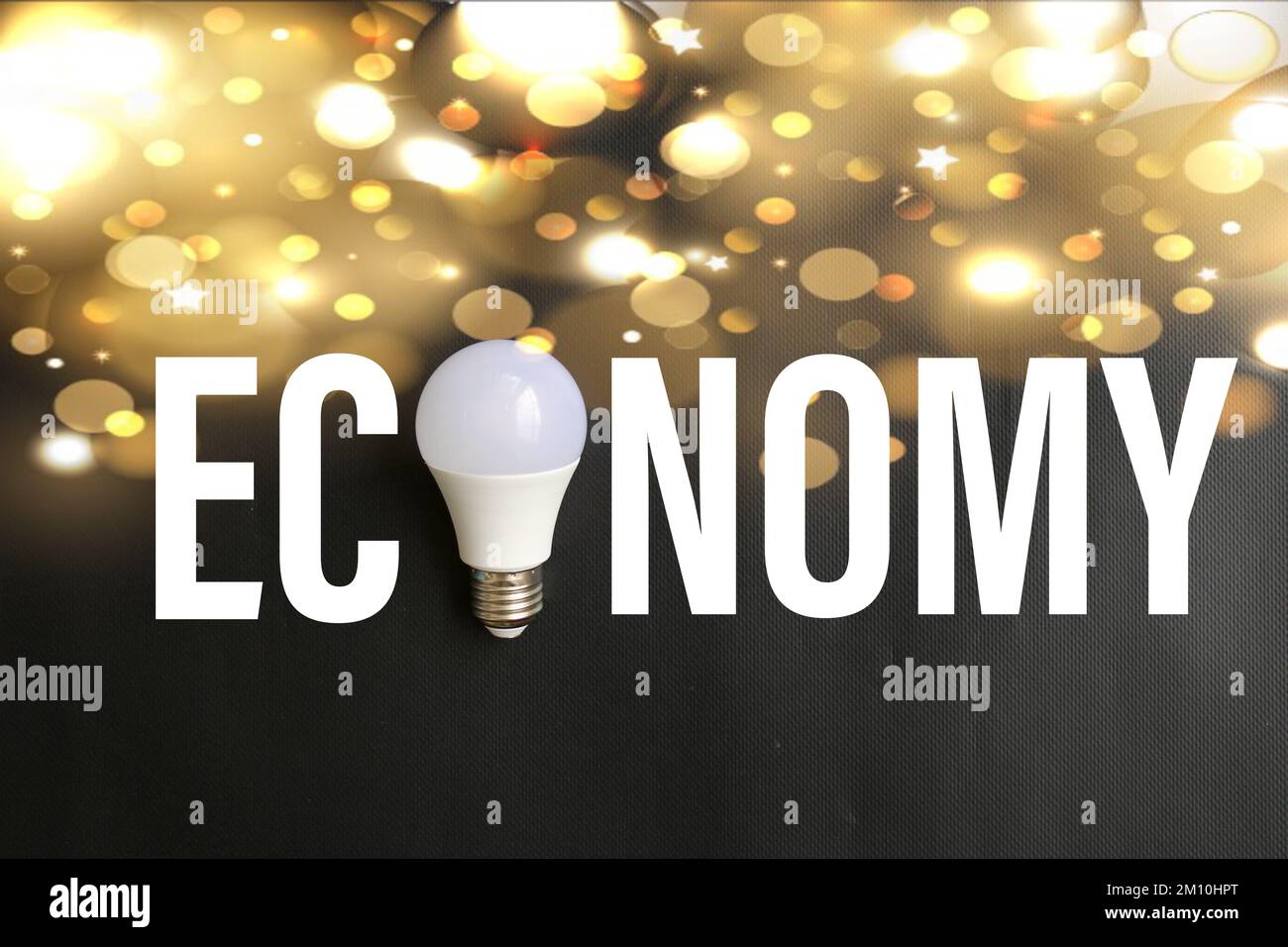 Economy lettering created from led bulb on colored background. Creative ...