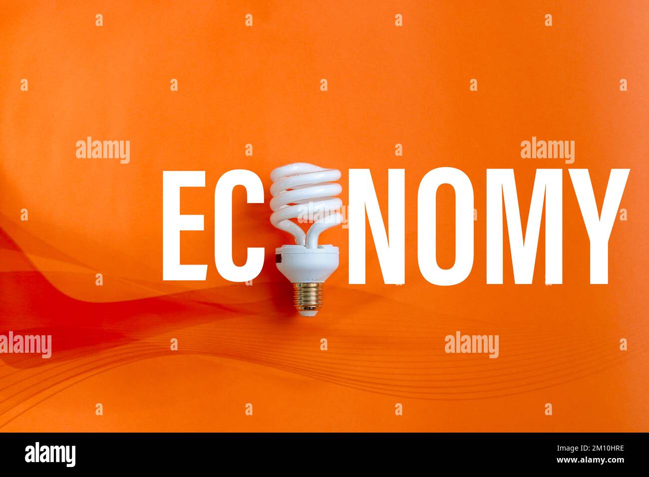 Economy lettering created from led bulb on colored background. Creative ...