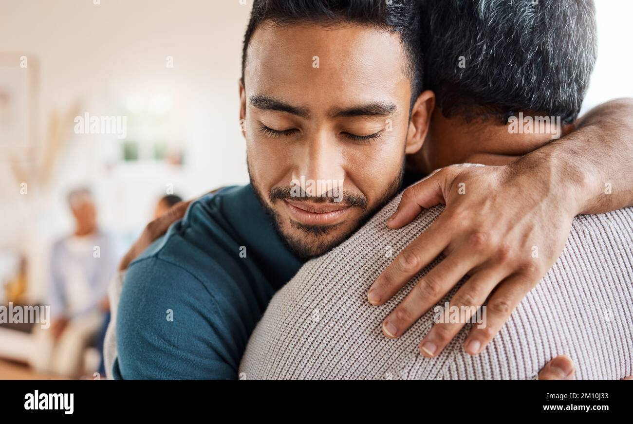 Hispanic family hugging greeting hi-res stock photography and images ...