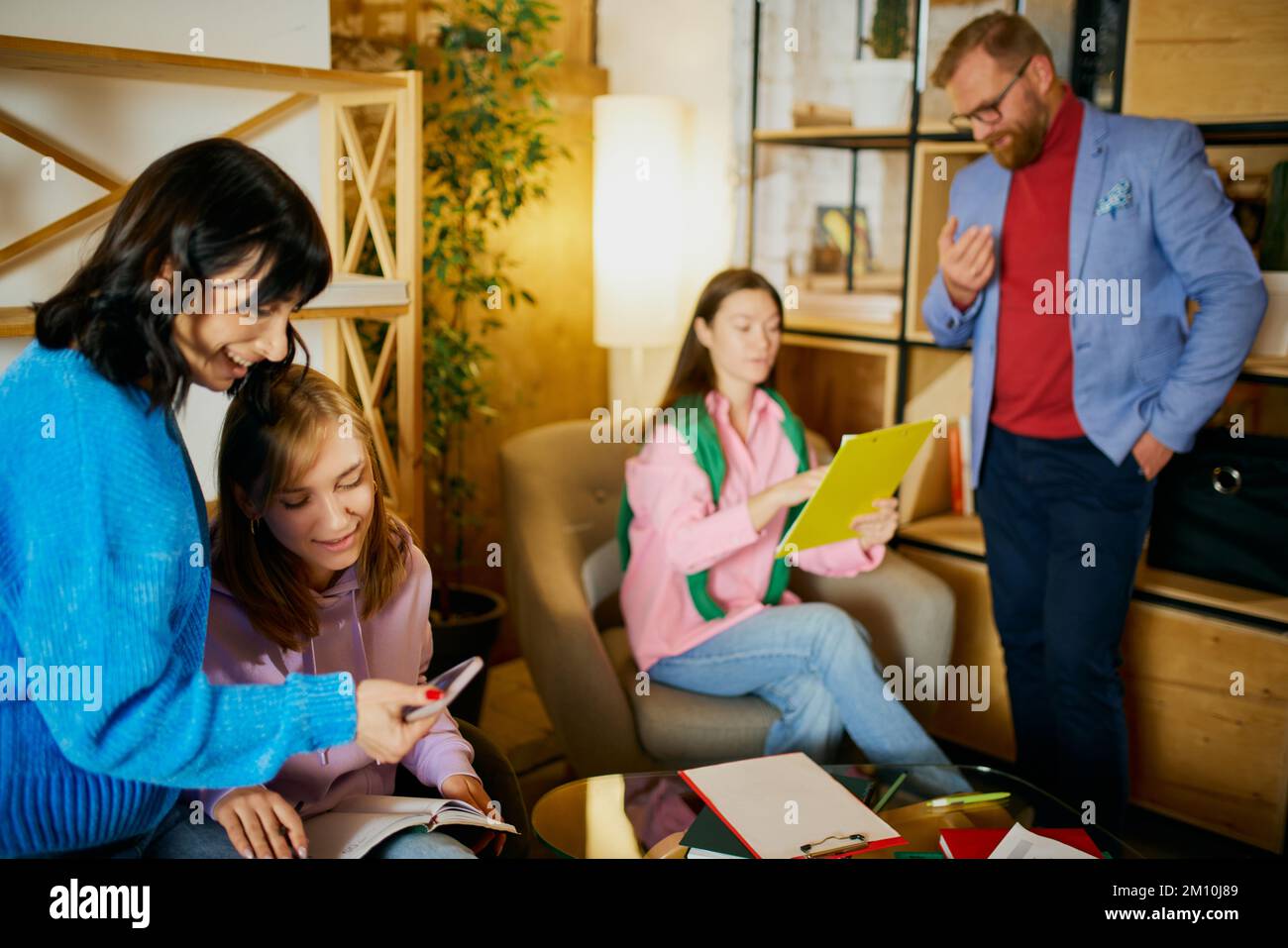 Working process. Employees, co-workers having lively communication ...