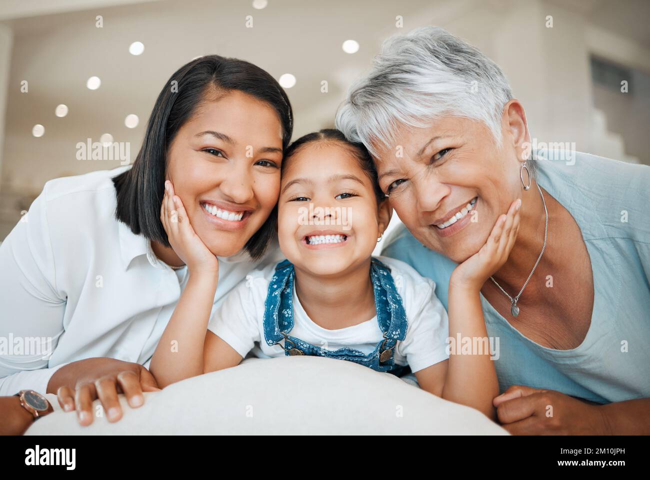 We start and end with the family. Portrait of a mature woman boding ...