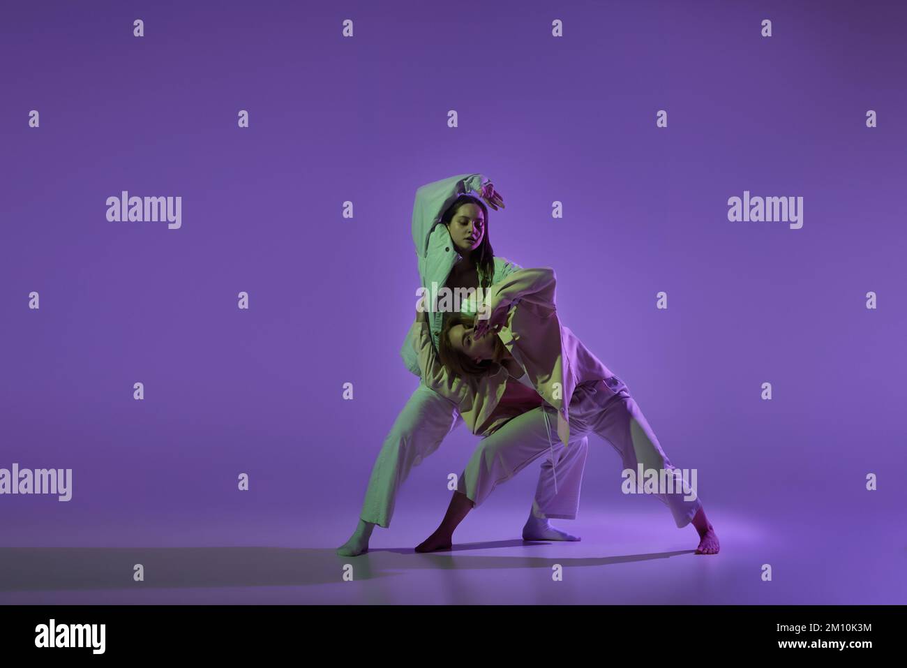 Dance performance. Stylish female dancers at contemporary choreography ...