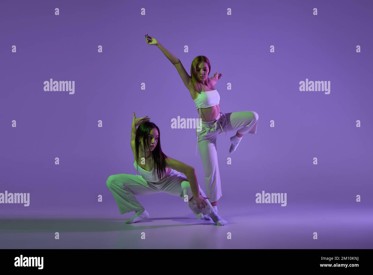 Dance performance. Stylish female dancers at contemporary choreography ...