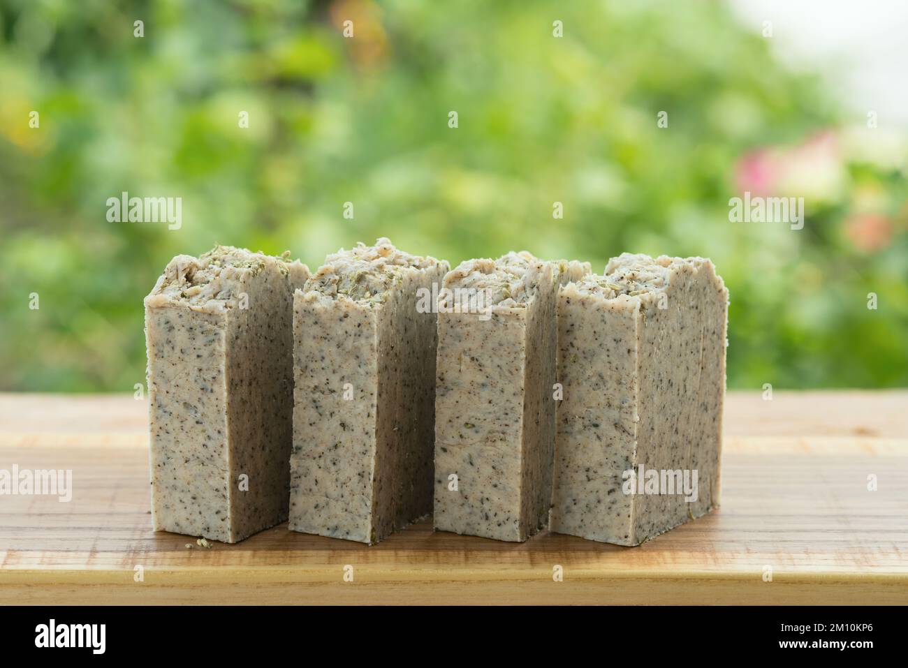 Green handmade scrub soap with wormwood and thyme Stock Photo - Alamy