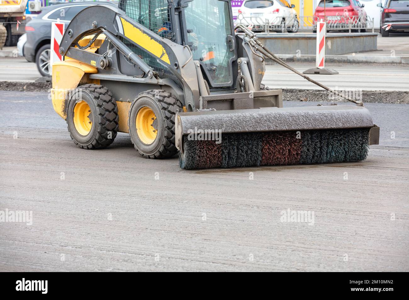 Cleaning the road during the repair of the roadway. Maneuverable road ...