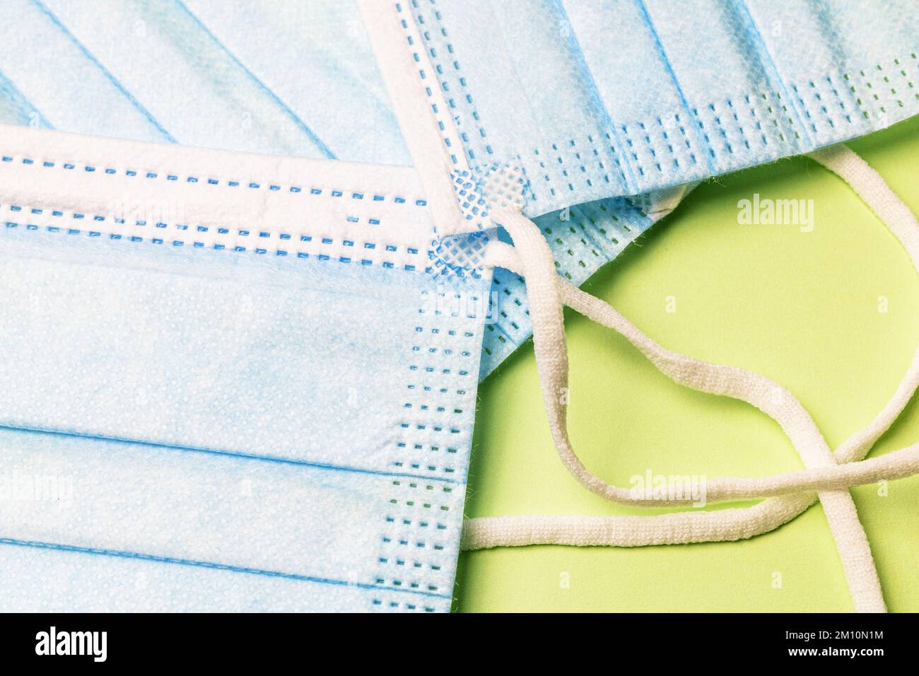 A medical cloth on a table with a green background Stock Photo - Alamy