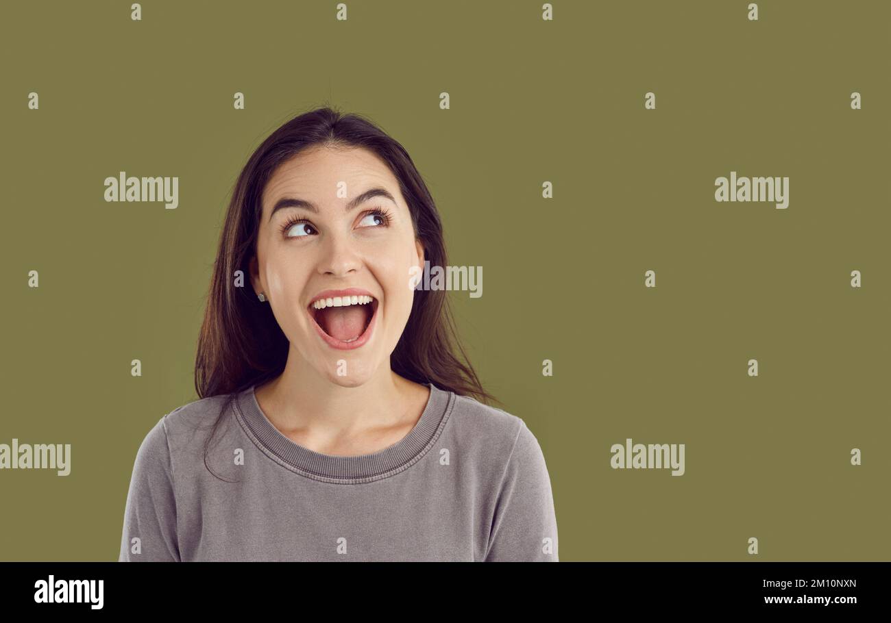 Photo of amazed excited girl with opened mouth Stock Photo - Alamy