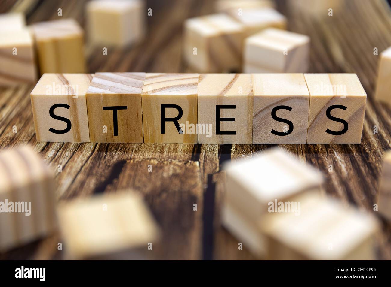 Stress - word from wooden blocks with letters, great worry caused by a ...