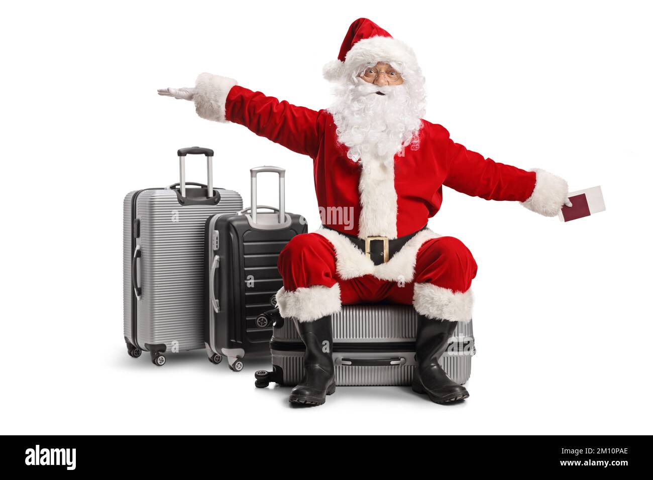 Santa claus sitting on a suitcase and flying with hands isolated on ...