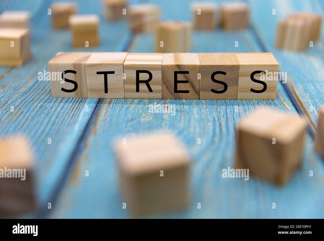 Stress - word from wooden blocks with letters, great worry caused by a ...