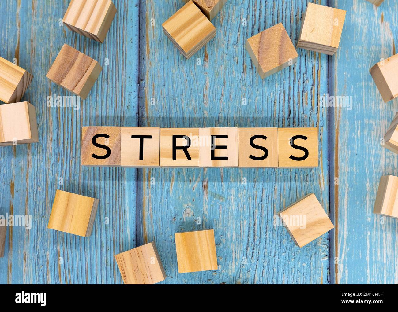 Stress - word from wooden blocks with letters, great worry caused by a ...
