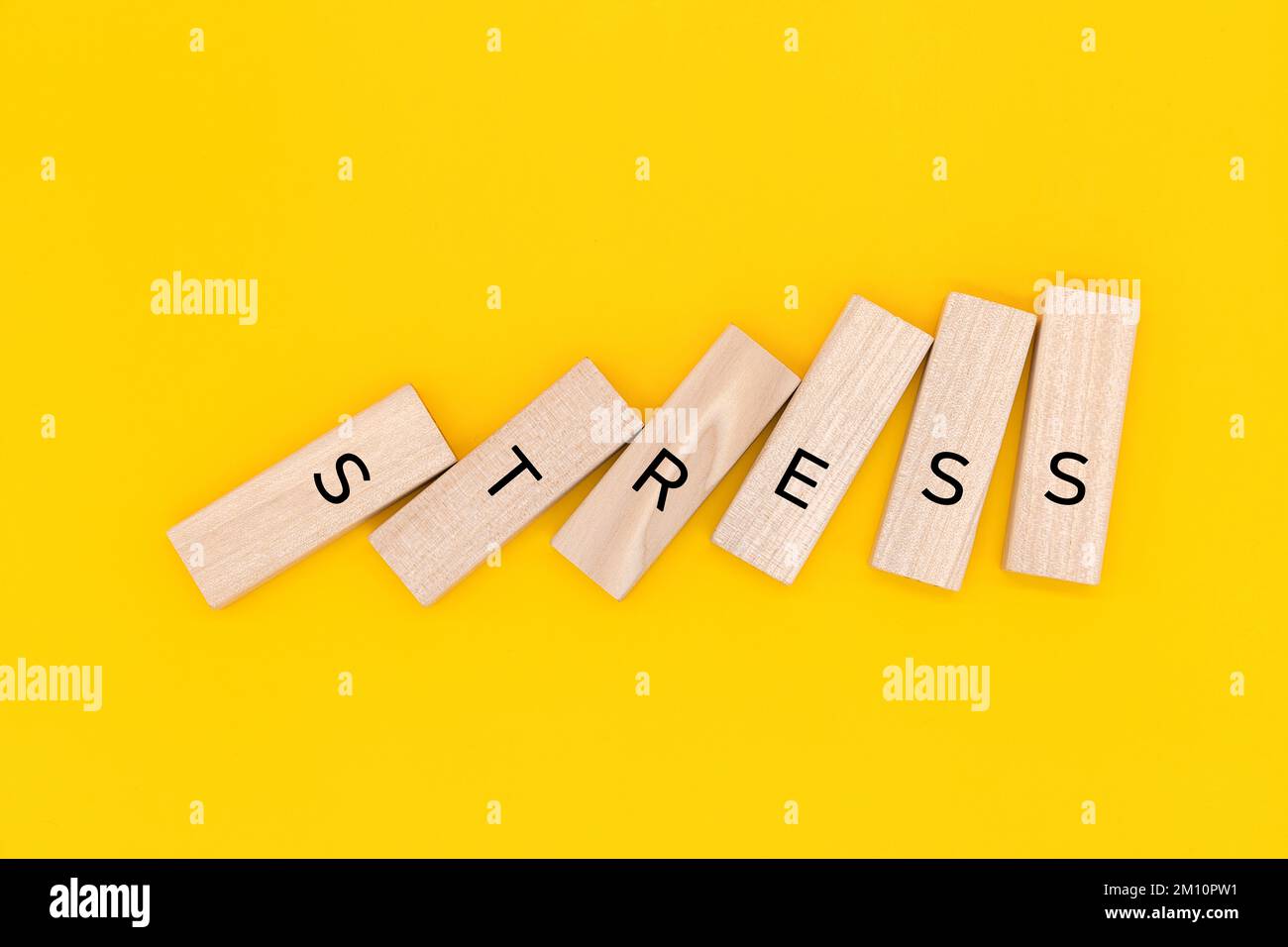 Stress - word from wooden blocks with letters, great worry caused by a ...