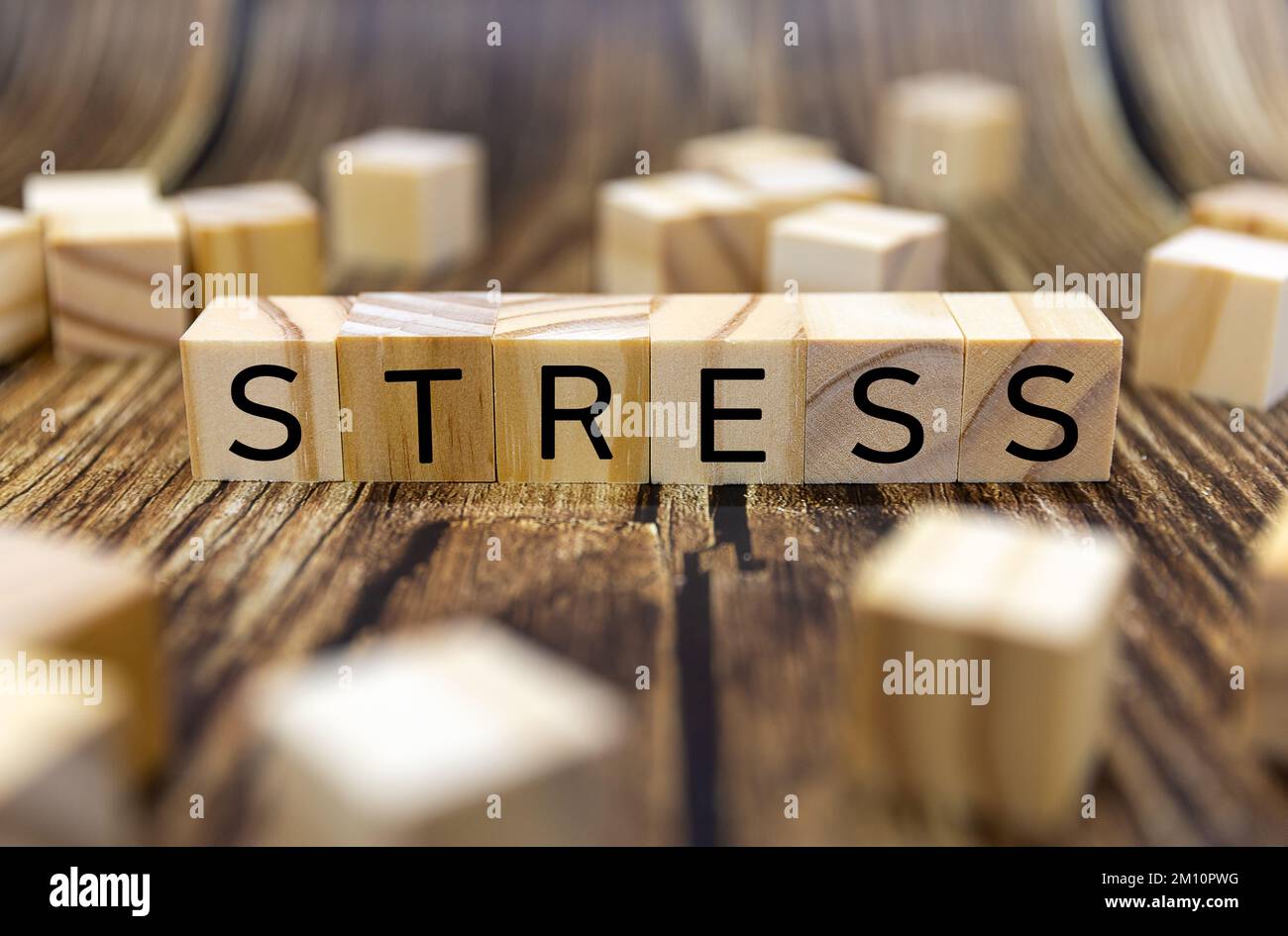 Stress - word from wooden blocks with letters, great worry caused by a ...