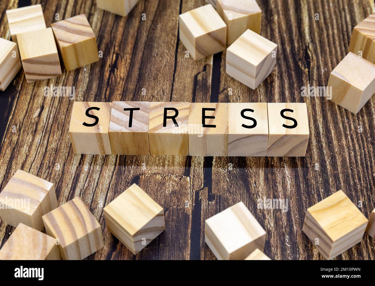Stress - word from wooden blocks with letters, great worry caused by a ...