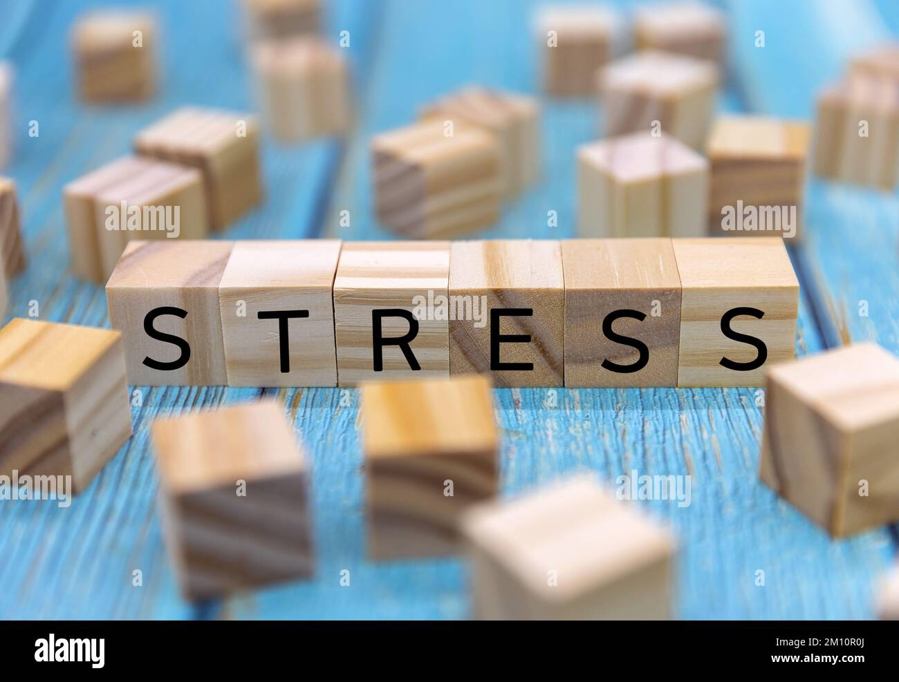 Stress - word from wooden blocks with letters, great worry caused by a ...