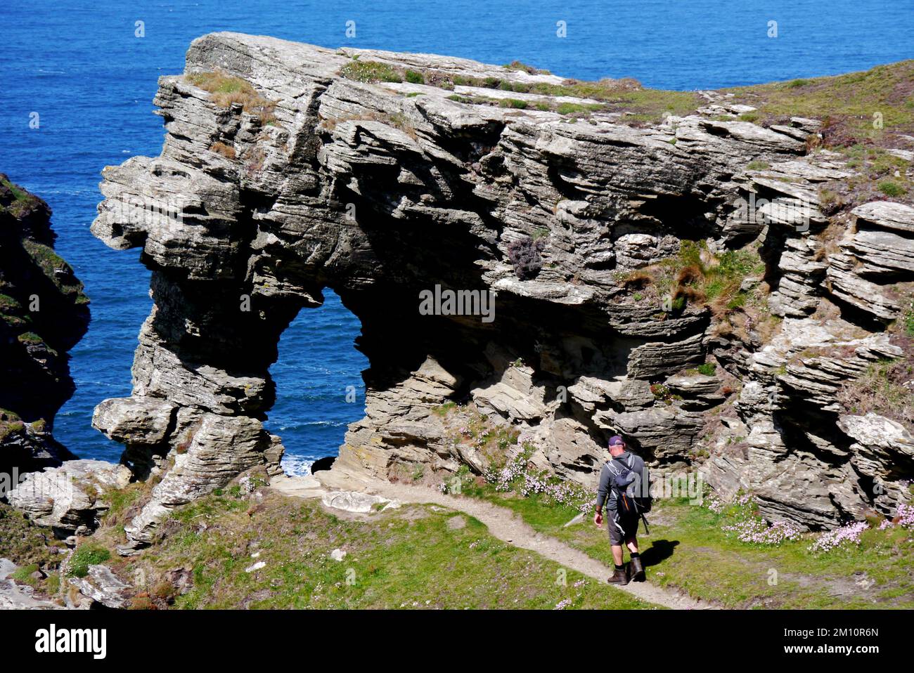 Man Walking on Path to The Natural Rock Arch (Ladies' Window) 'Hole ...