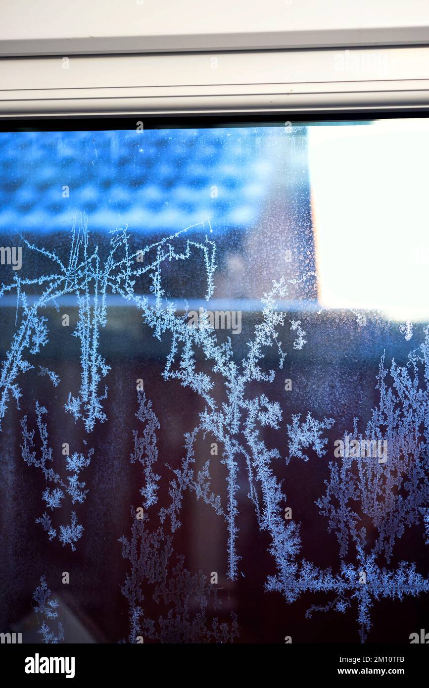 frost patterns on glass Stock Photo - Alamy