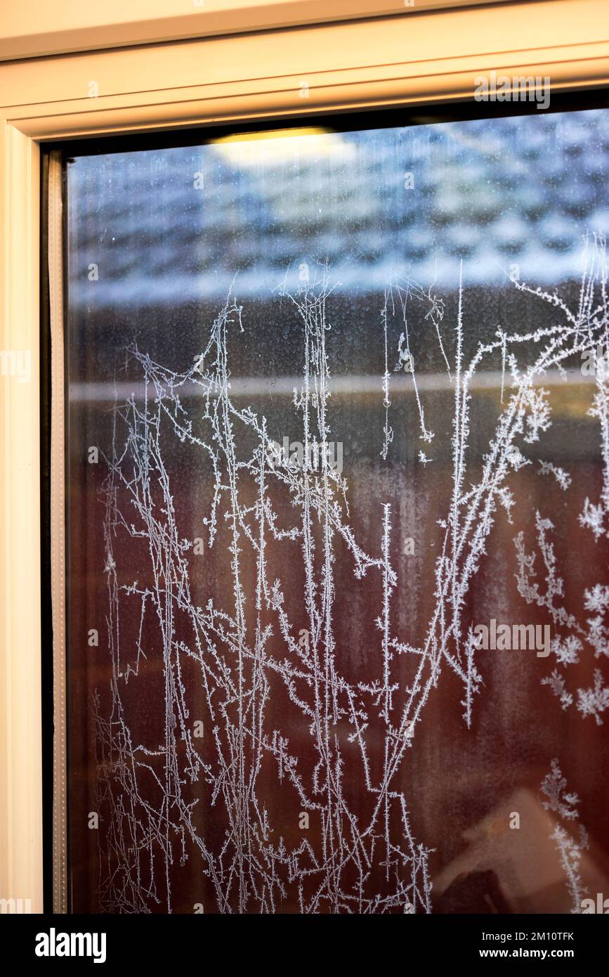 frost patterns on glass Stock Photo - Alamy