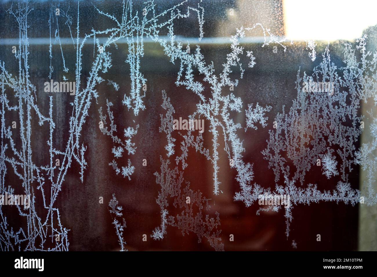 frost patterns on glass Stock Photo - Alamy