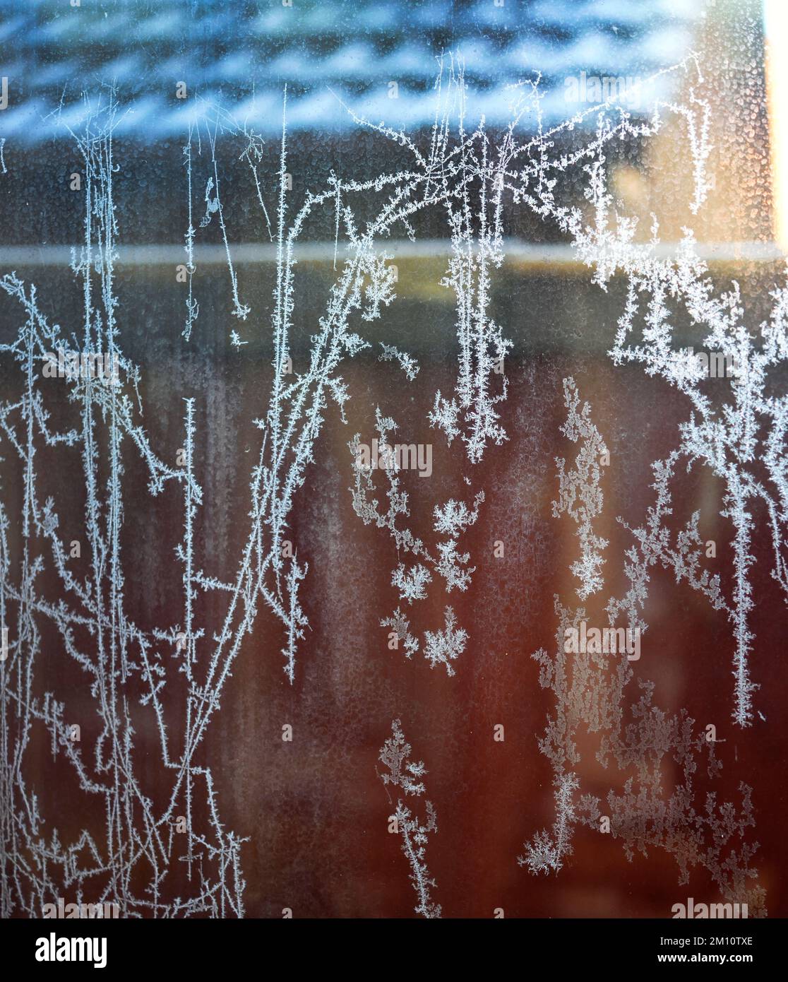 frost patterns on glass Stock Photo - Alamy