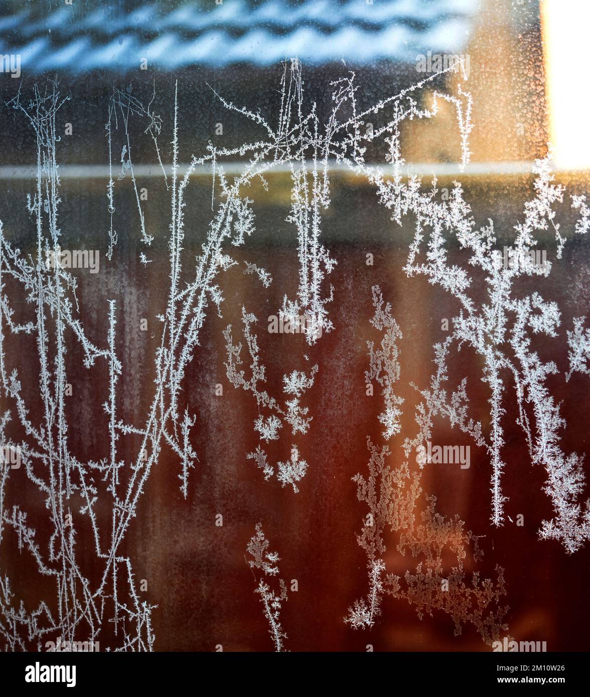frost patterns on glass Stock Photo - Alamy