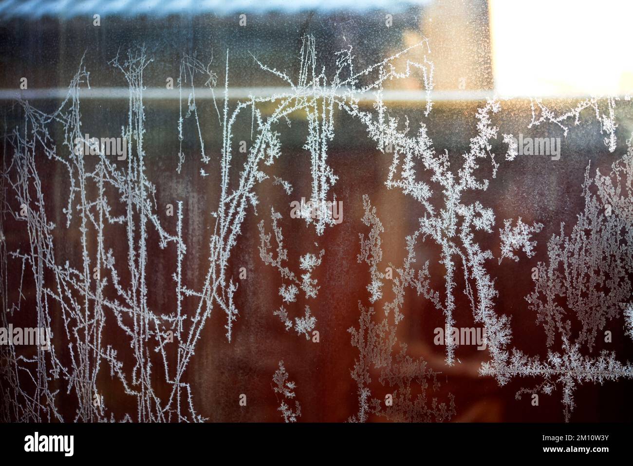 frost patterns on glass Stock Photo - Alamy