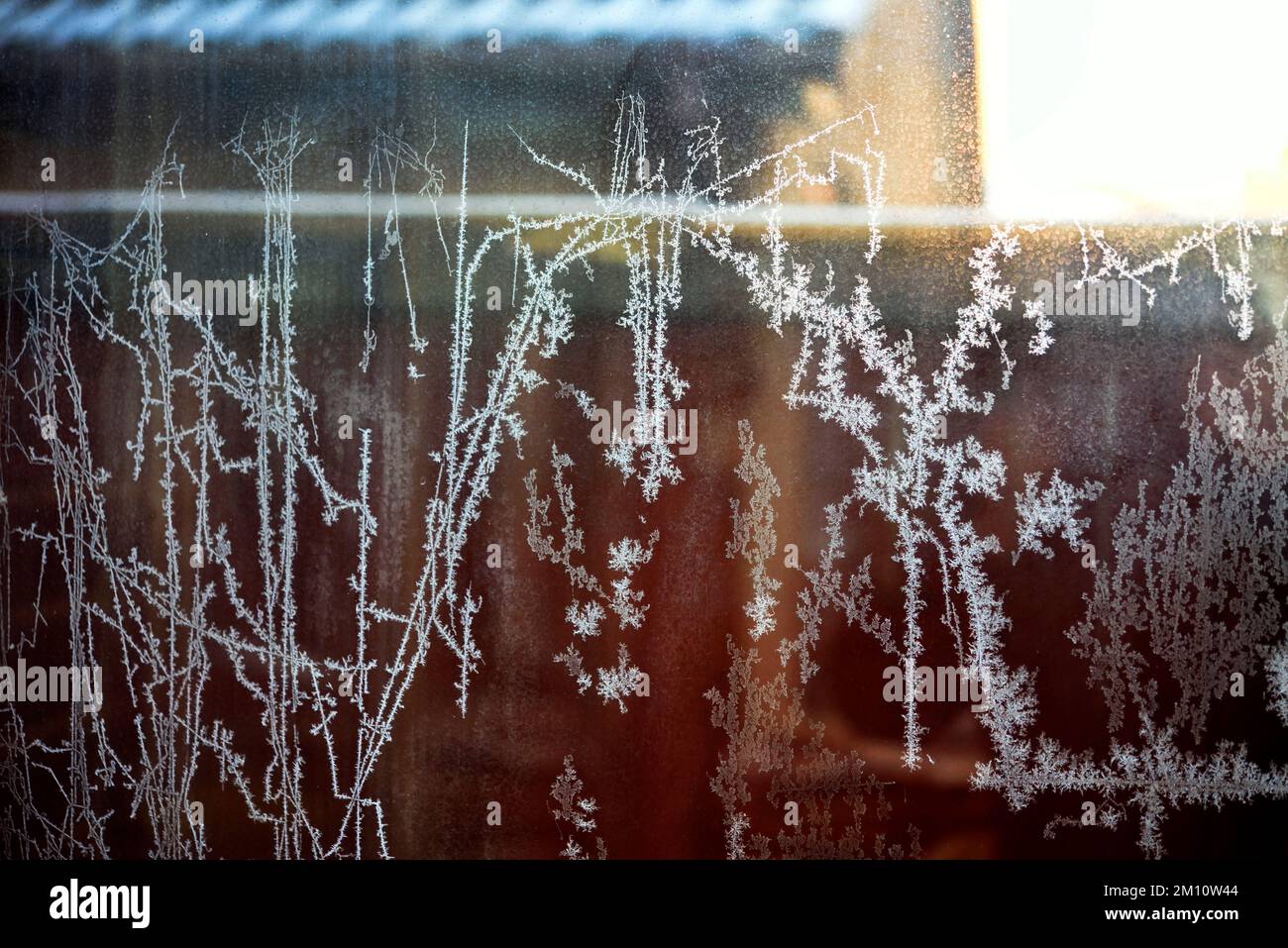 frost patterns on glass Stock Photo - Alamy