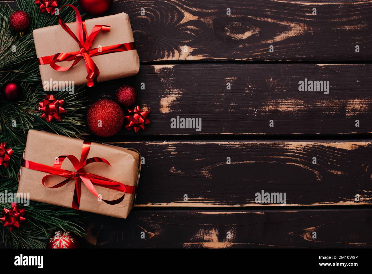 Christmass flatlay gift boxes,red christmas tree toys and spruce brance ...