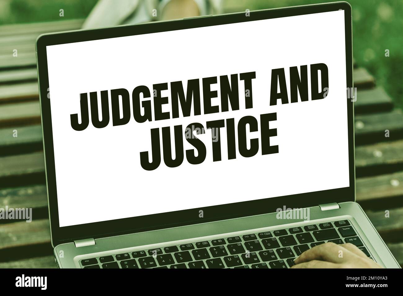 Hand writing sign Judgement And Justice. Internet Concept system of ...