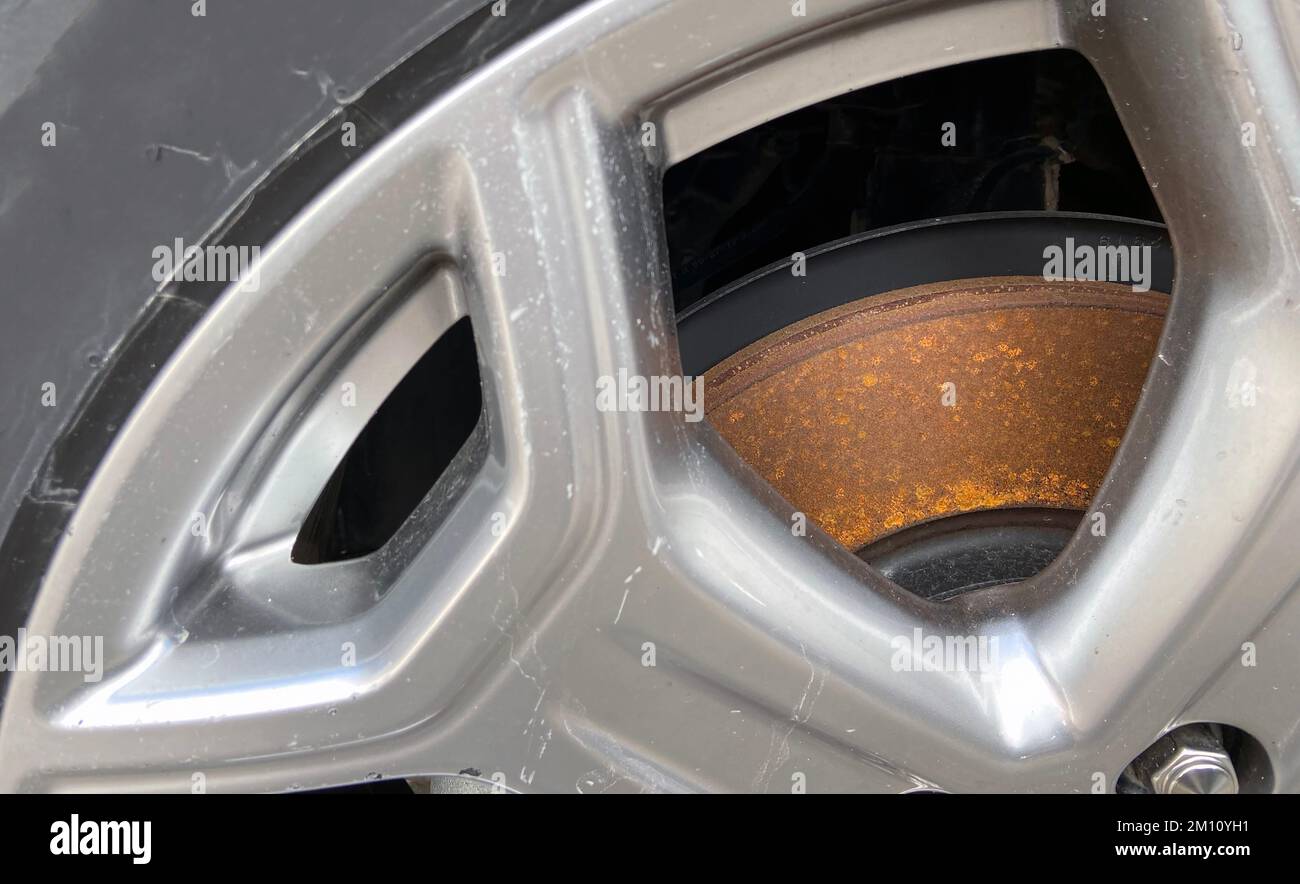 car brake disc and pad rusted after the rain Stock Photo - Alamy