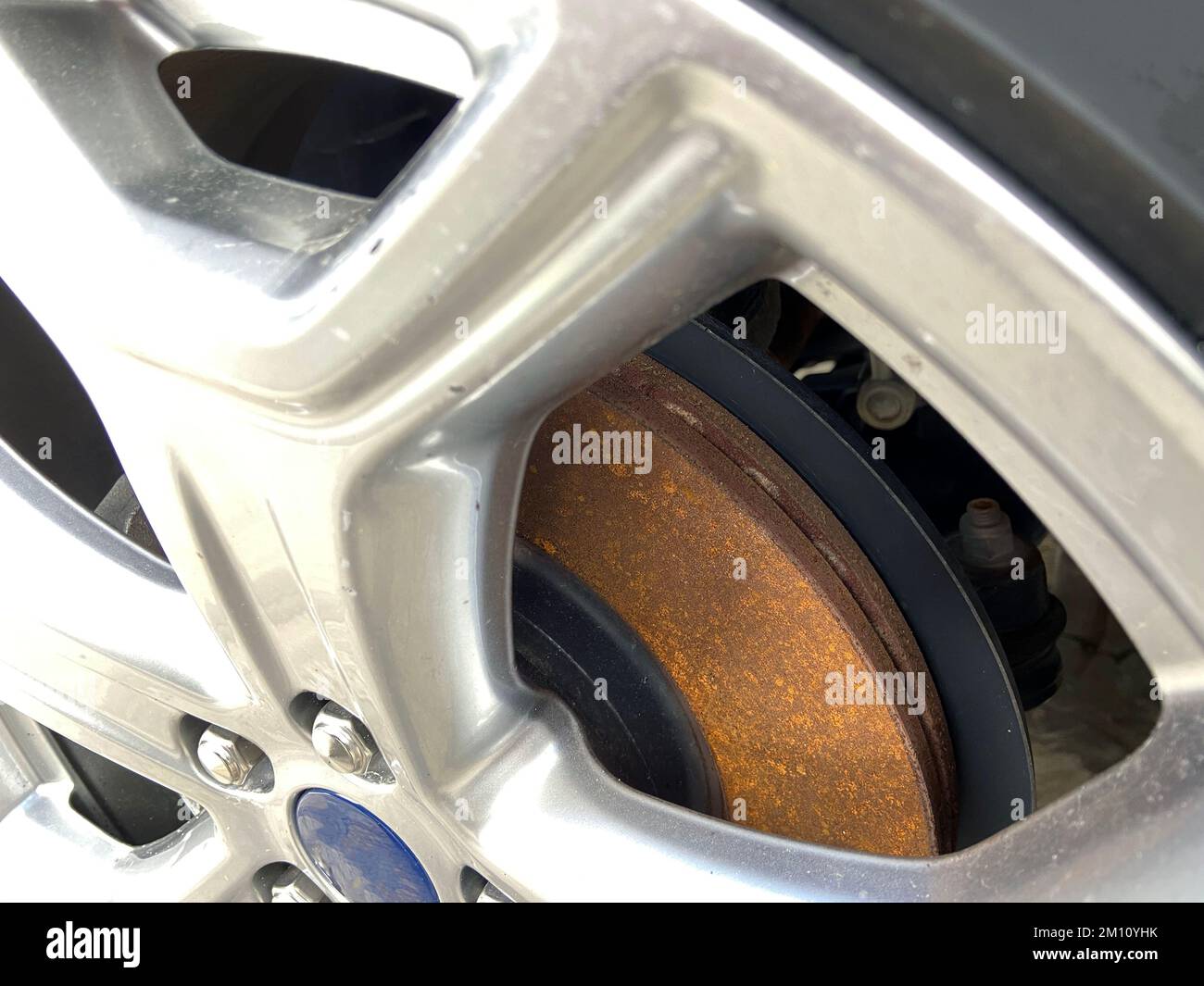 car brake disc and pad rusted after the rain Stock Photo - Alamy