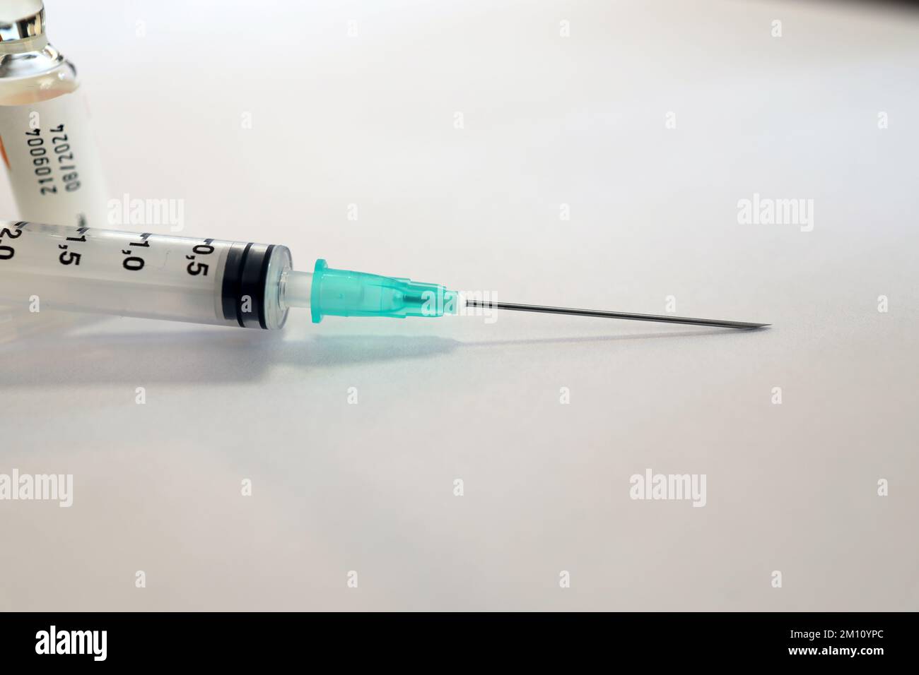injection needle and ampoule for injection on white background Stock ...