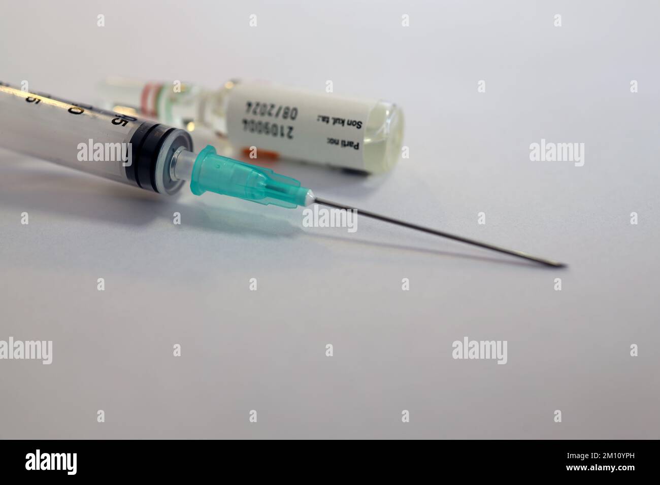 injection needle and ampoule for injection on white background Stock ...