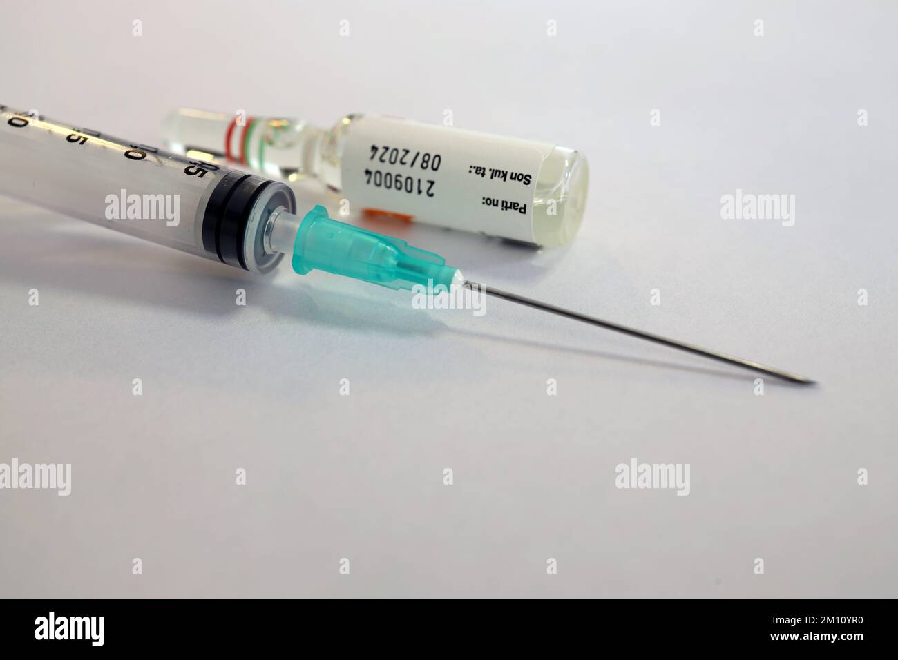 injection needle and ampoule for injection on white background Stock ...