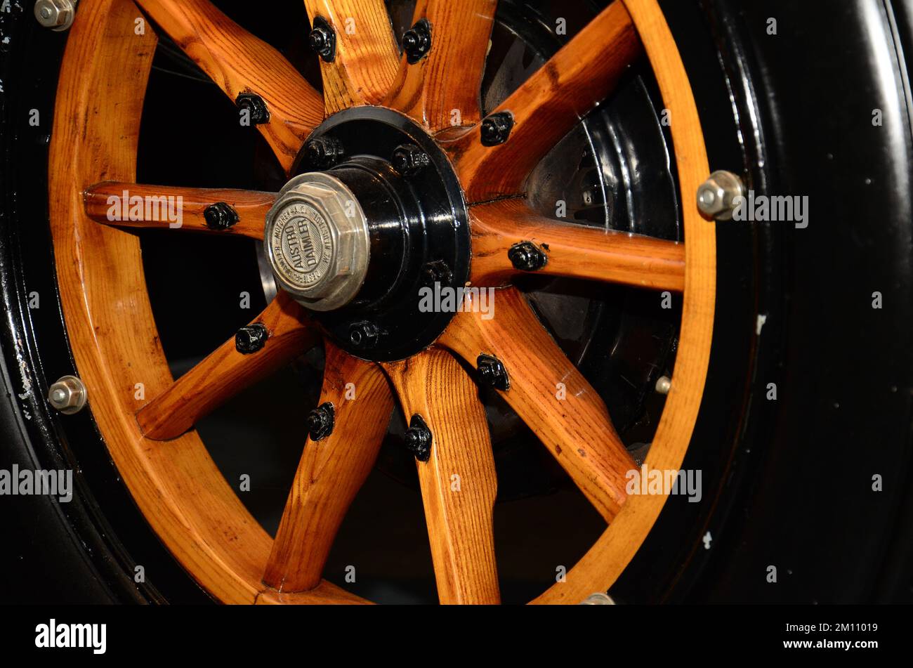 Close up view of antique wooden car wheel of a Austro daimler in a ...