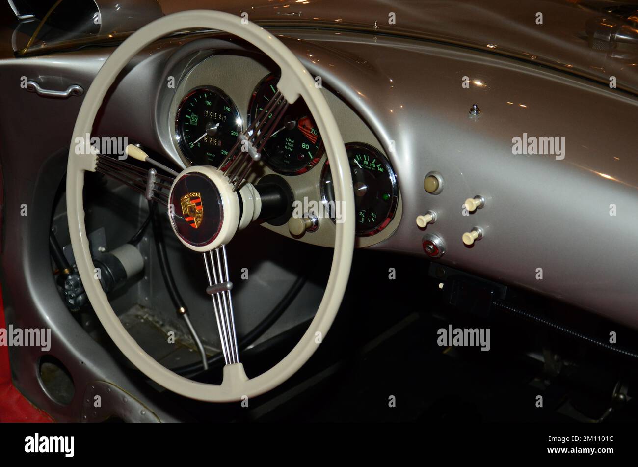 Close up view of antique steering wheel of a classic Porsche in a ...
