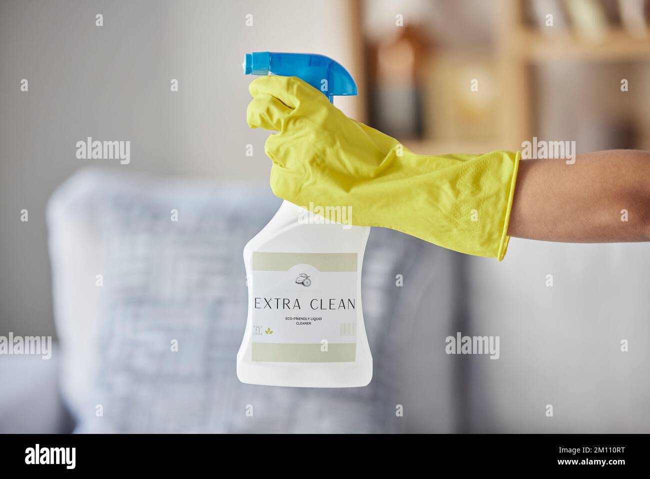Cleaning, product and spray bottle with hands of woman in living room ...