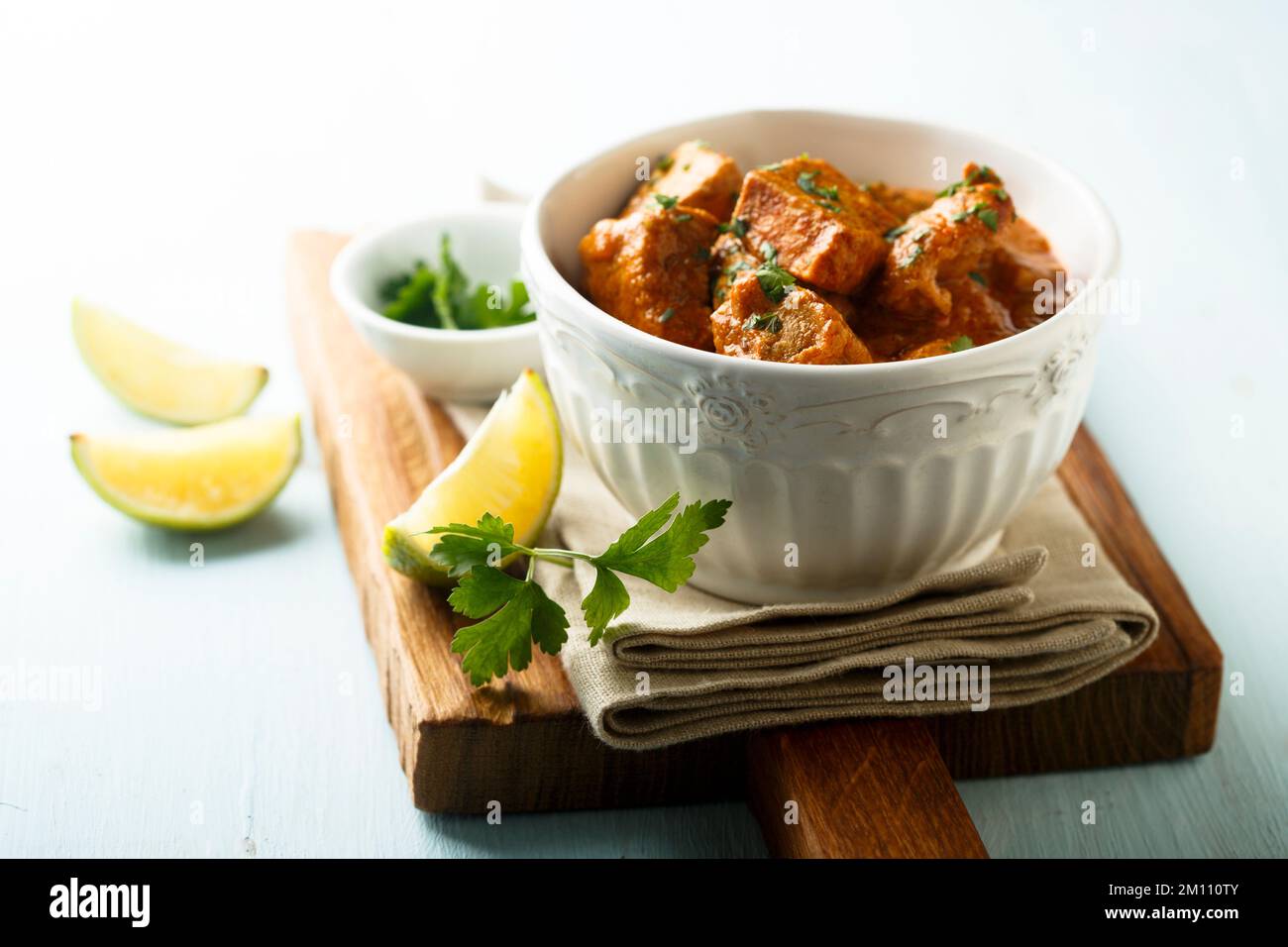 Homemade chicken curry with fresh parsley Stock Photo - Alamy
