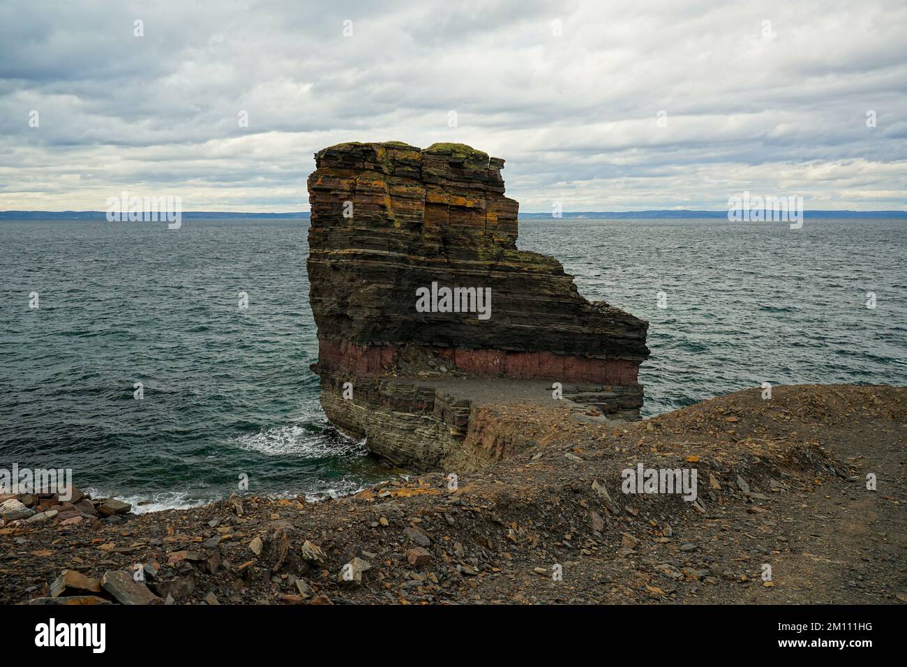 Grebe's nest is a dramatic rock formation in Newfoundland, Canada Stock ...